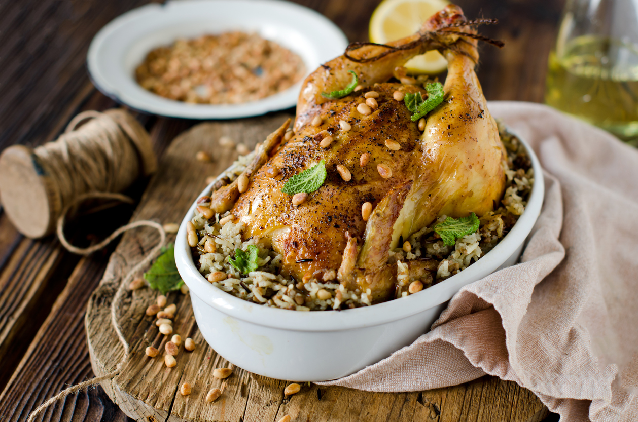 Whole Roasted Chicken Stuffed with Wild Rice & Pine Nuts | Diane Kochilas