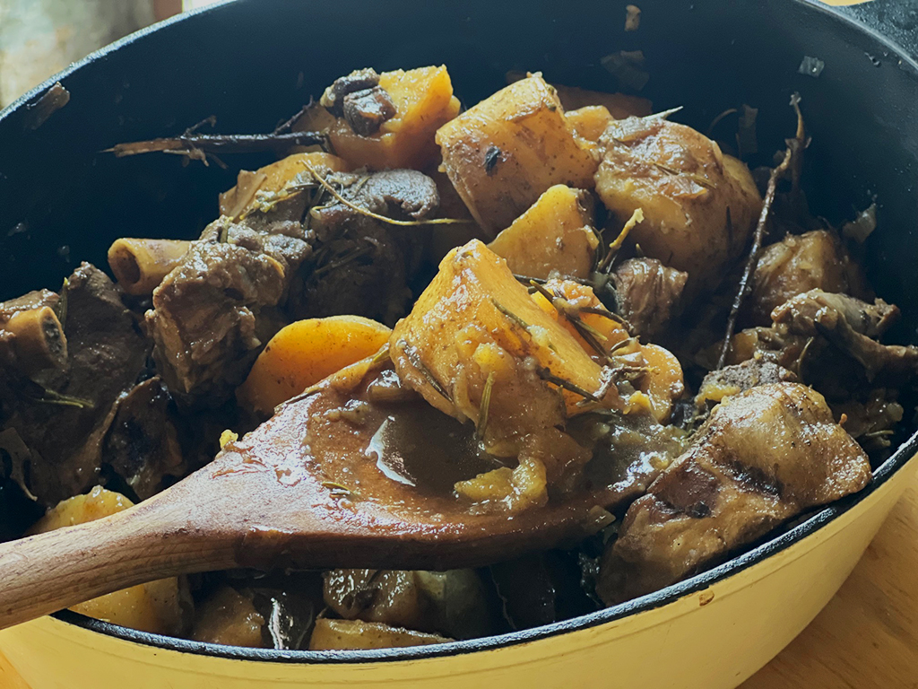 Lemony Braised Goat With Blackened Garlic and White Wine